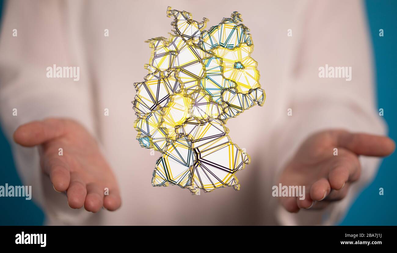 A germany map digital in hand 3d Stock Photo - Alamy