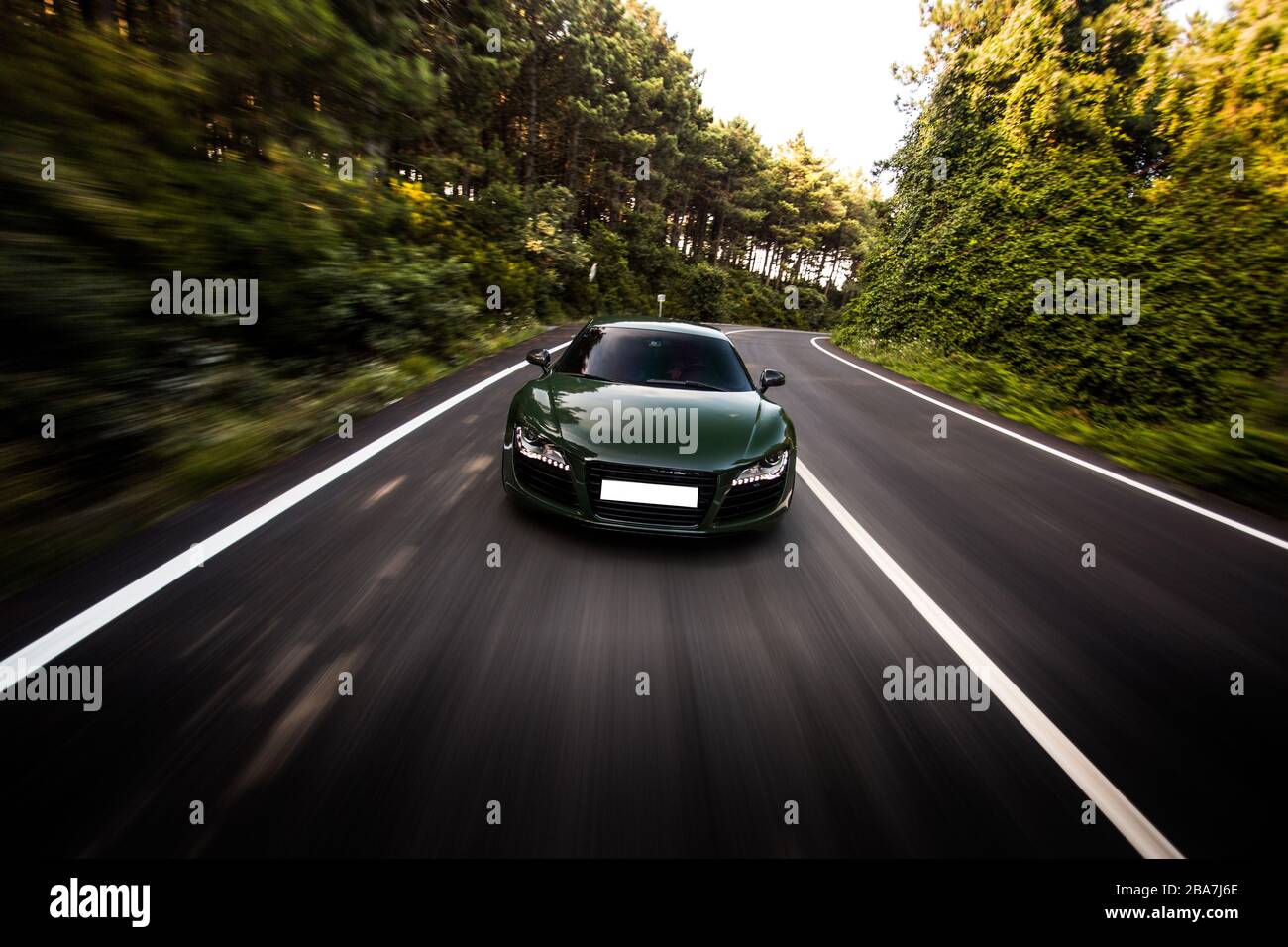 Car driving in the forest hi-res stock photography and images - Alamy