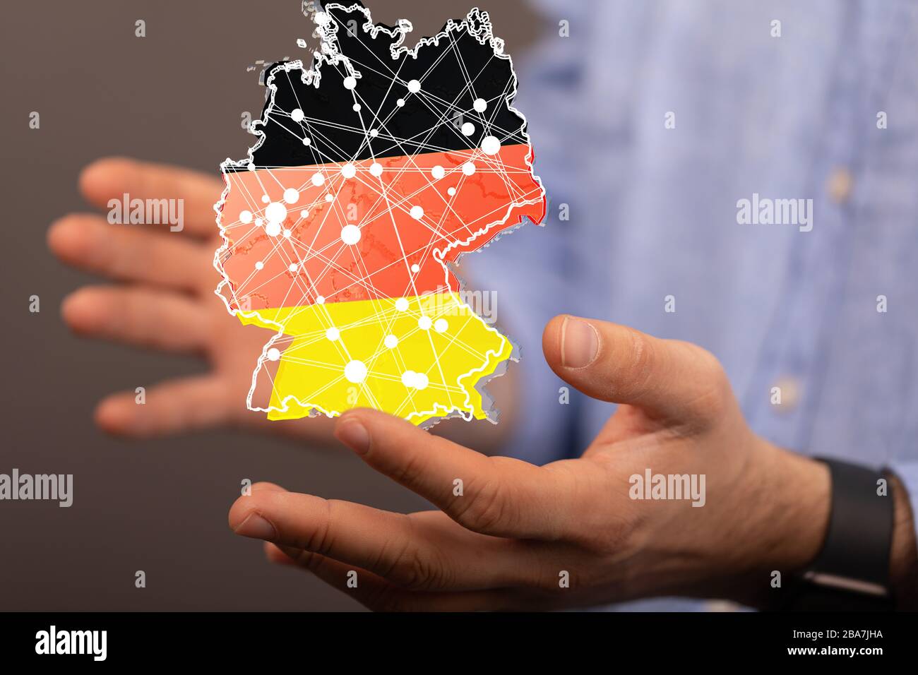 A a virtual germany land map digital in hand 3d Stock Photo - Alamy