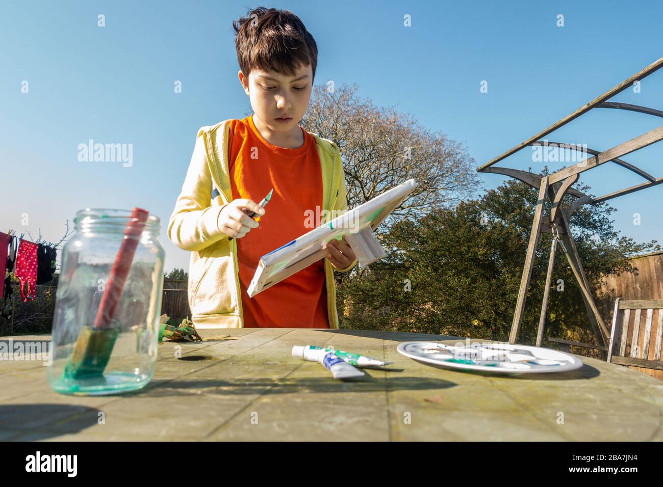 Boy doing art hi-res stock photography and images - Alamy