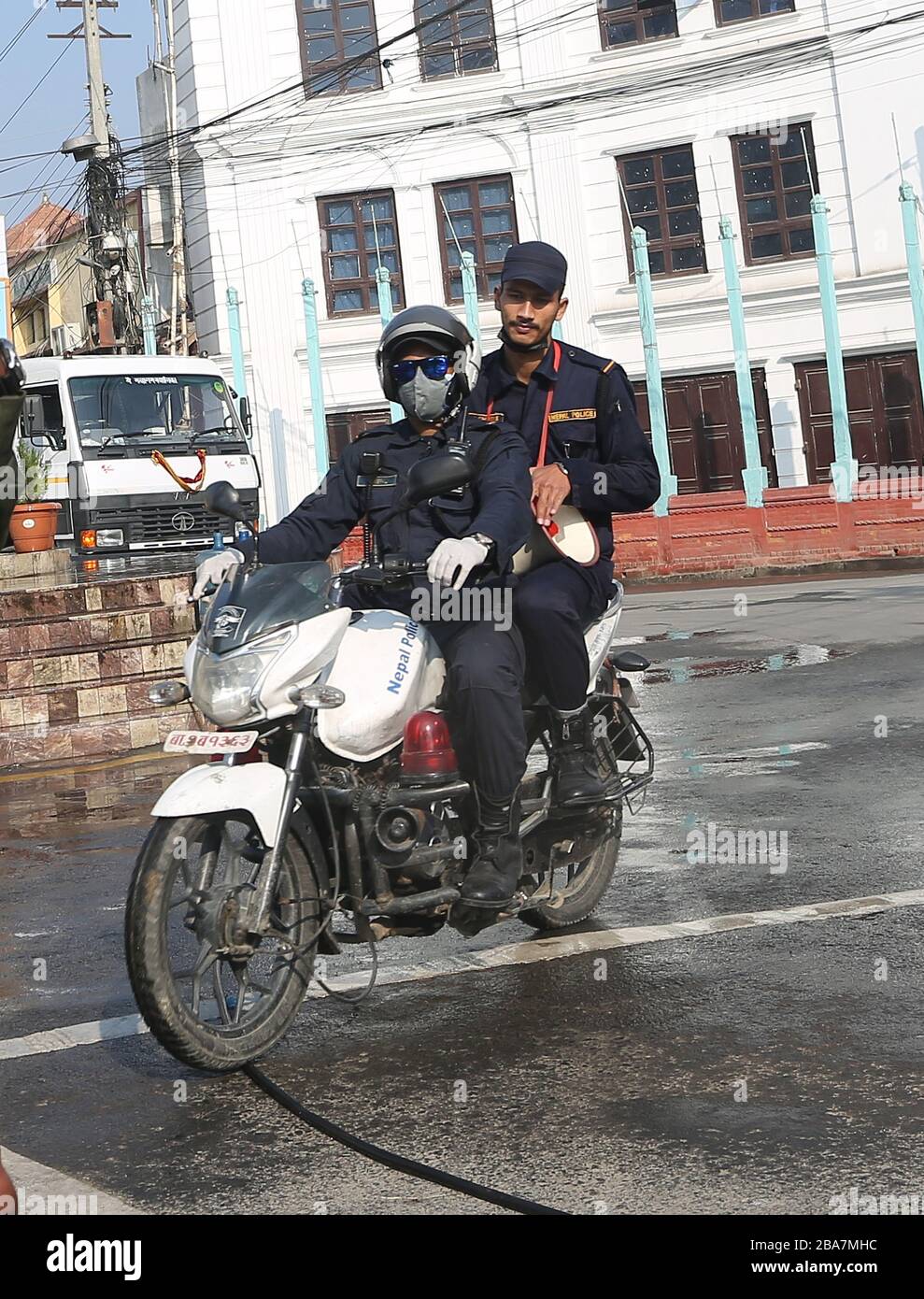 Kathmandu, Nepal. 26th Mar, 2020. Nepal police personnel are seen with ...