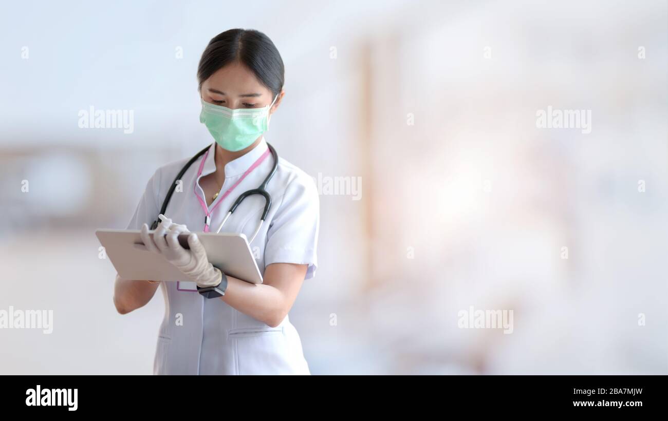 Doctor Writing In Patient Chart High Resolution Stock Photography and ...