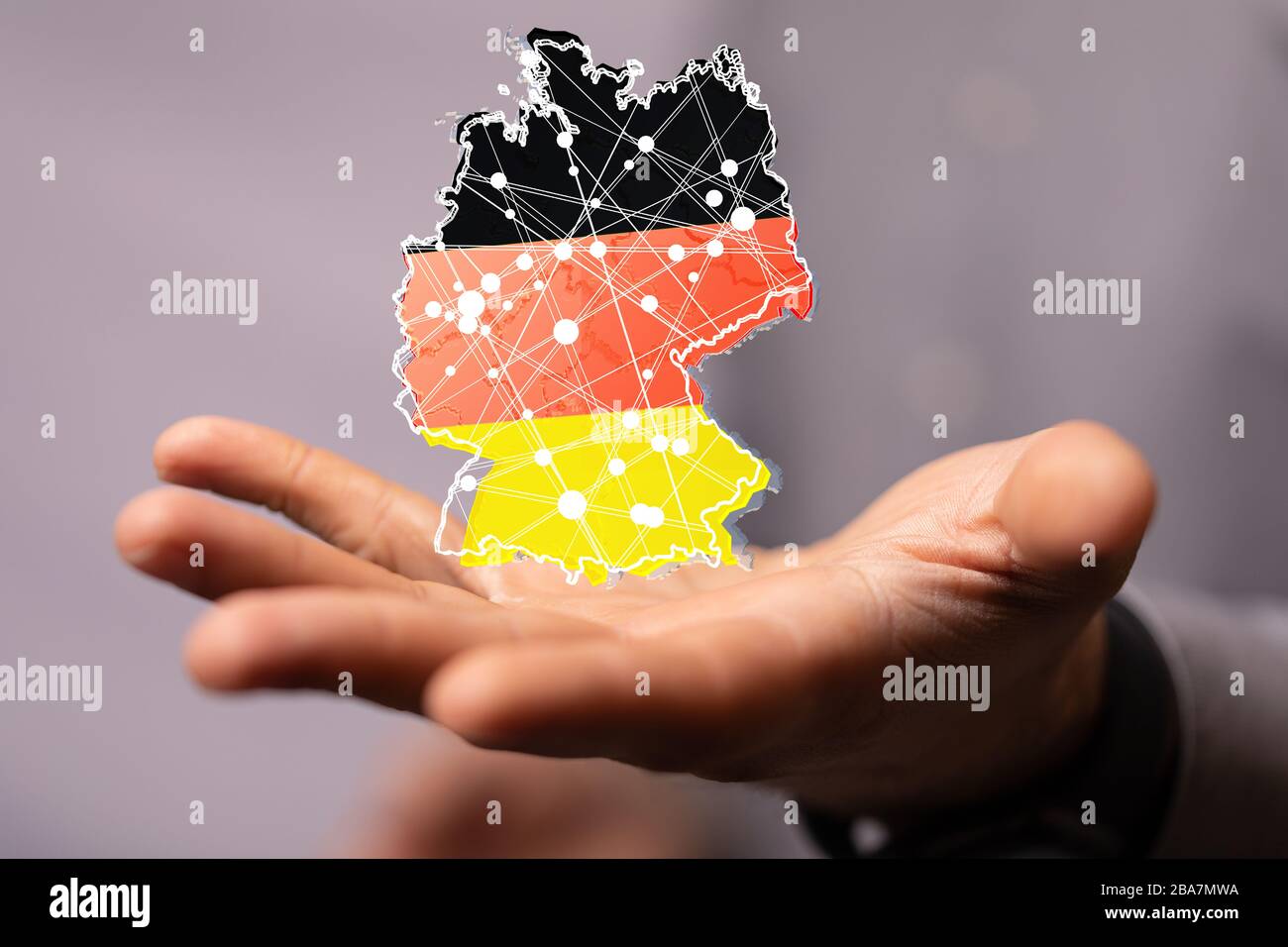 A germany map digital in hand 3d Stock Photo - Alamy
