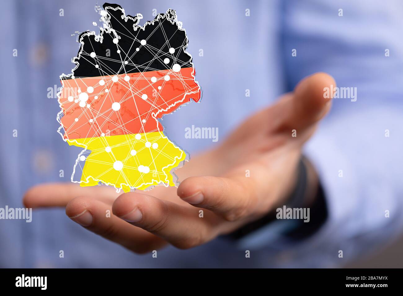 A germany map digital in hand 3d Stock Photo - Alamy