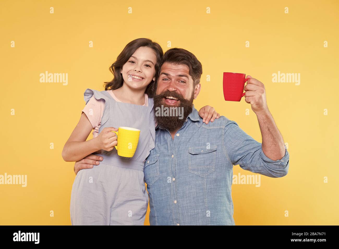 Drink healthy live well. Happy family drink milk tea. Little child and ...