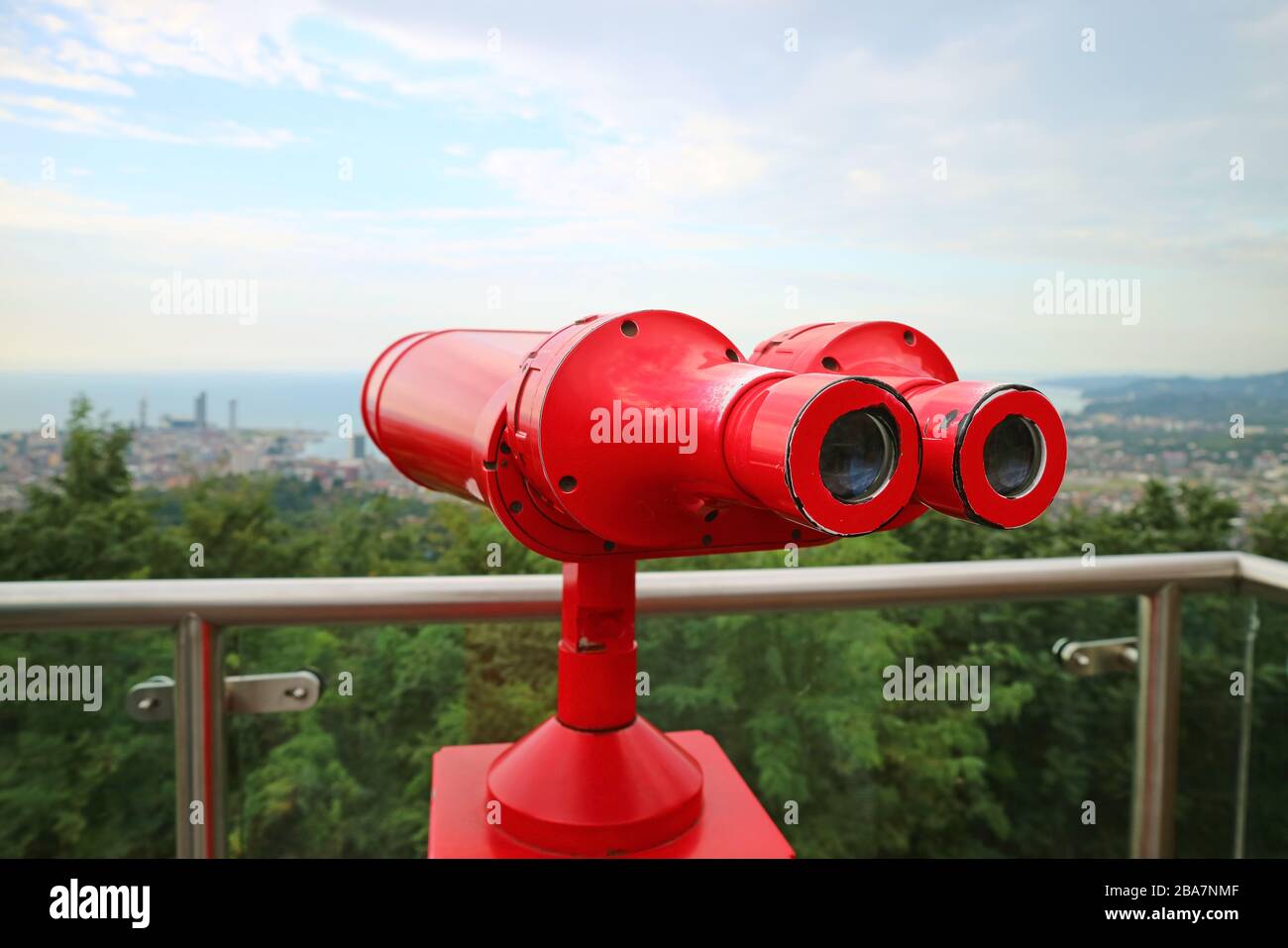 Closeup Vivid Red Binoculars on the Observation Deck with Copy Space ...