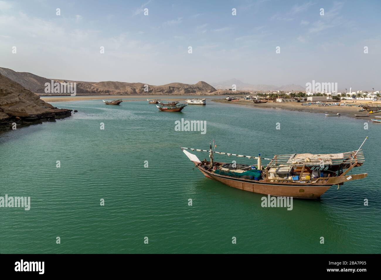 The city of Sur, Oman. Showing traditional boats moored up in the ...