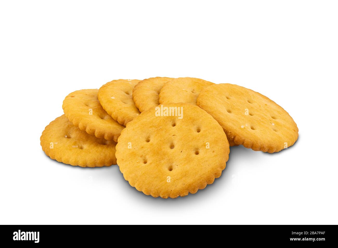 Pile of crunchy round crackers on white background with clipping path ...