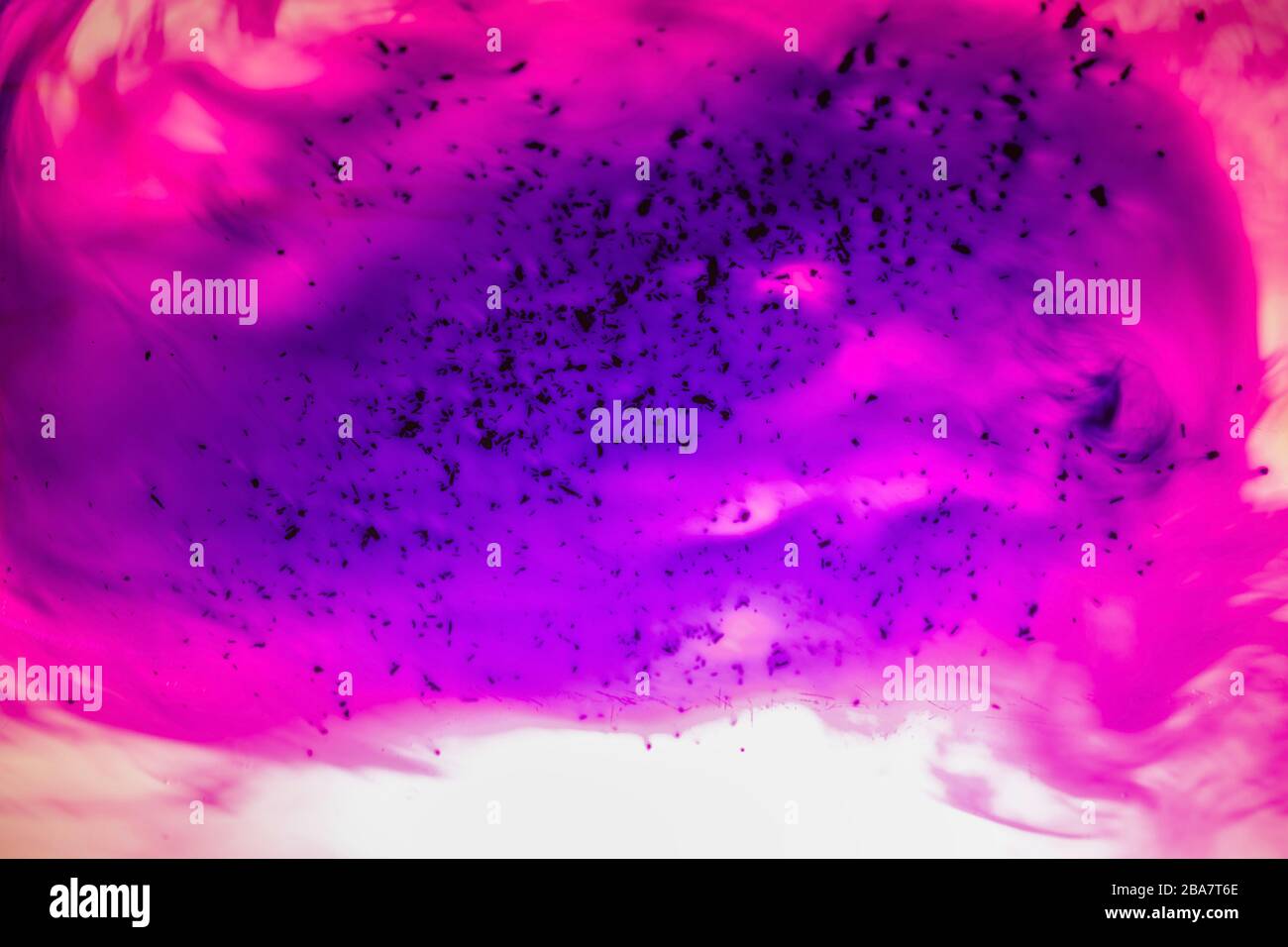 Purple and magenta colorful patches, potassium permanganate solution ...