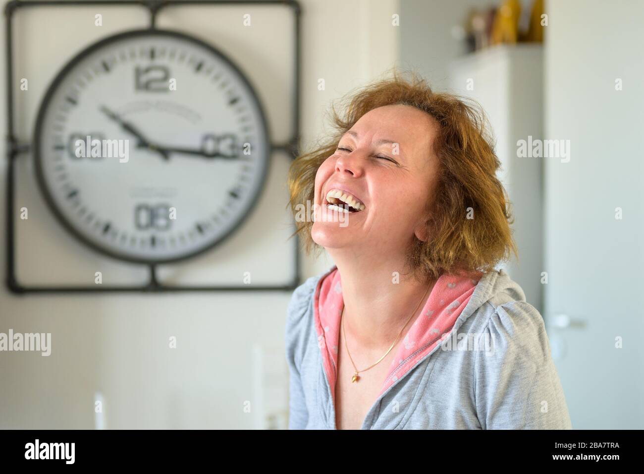 Woman laughing head back hi-res stock photography and images - Alamy