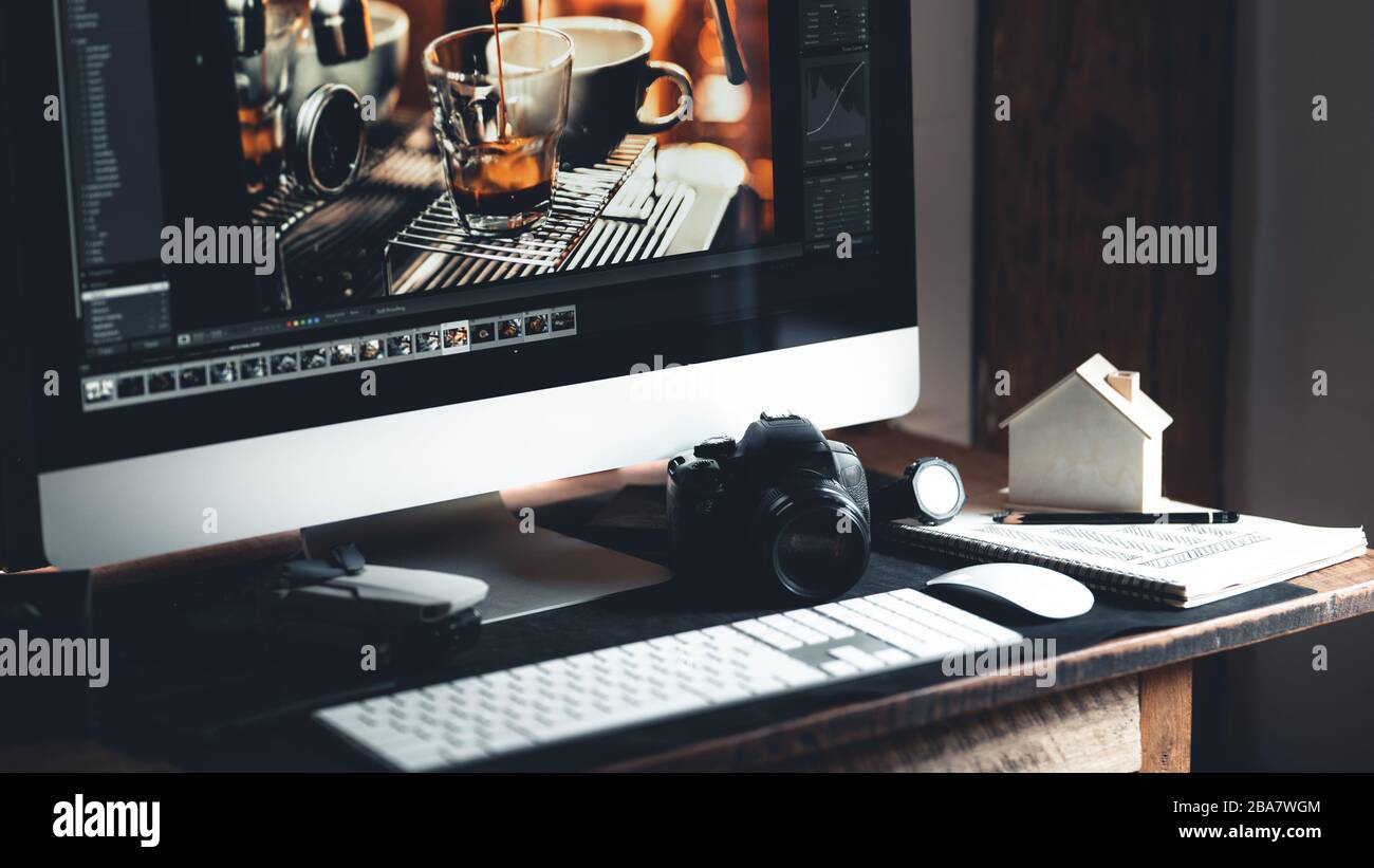 Home office desk,Computers and cameras on the desk,Work at home Stock ...