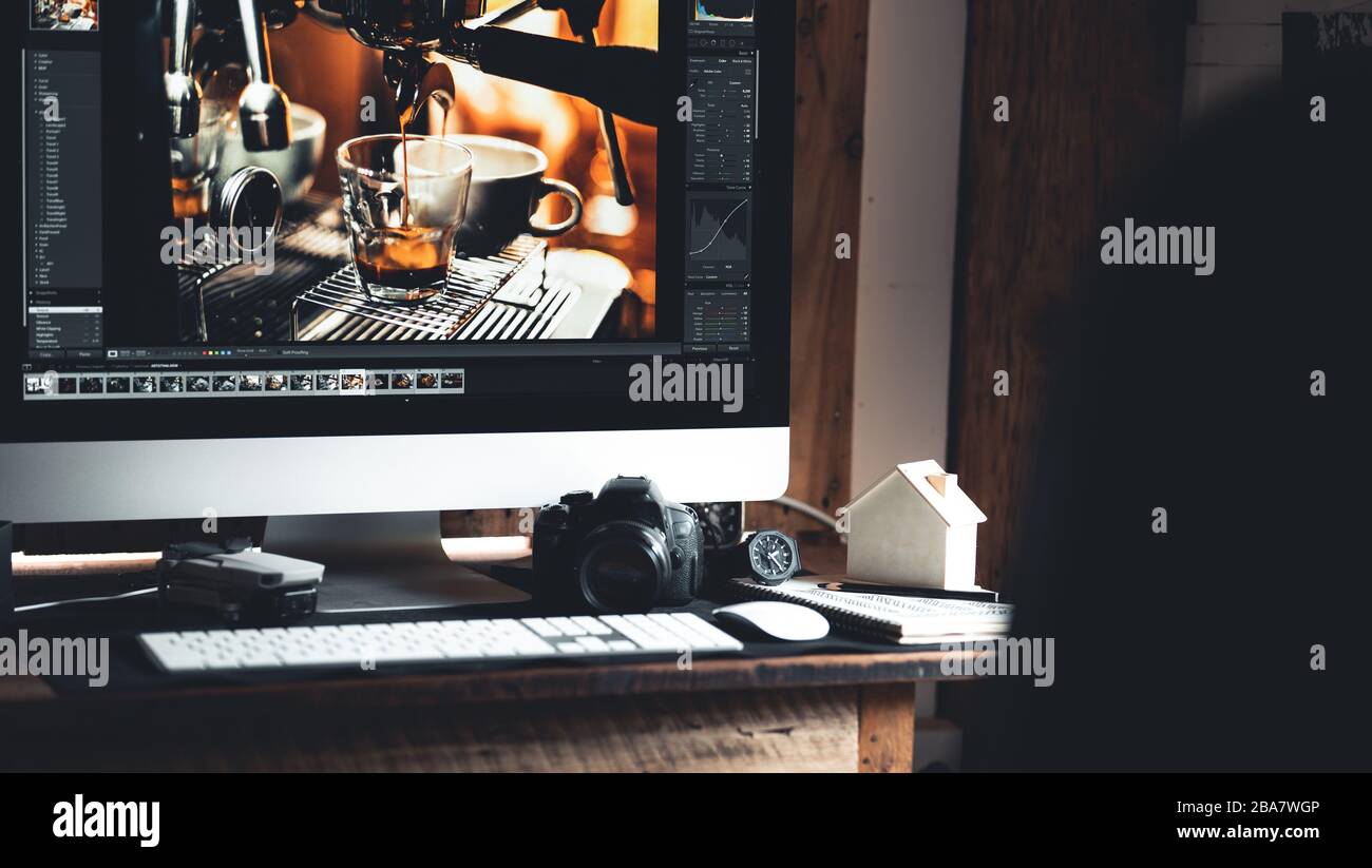 Home office desk,Computers and cameras on the desk,Work at home Stock ...