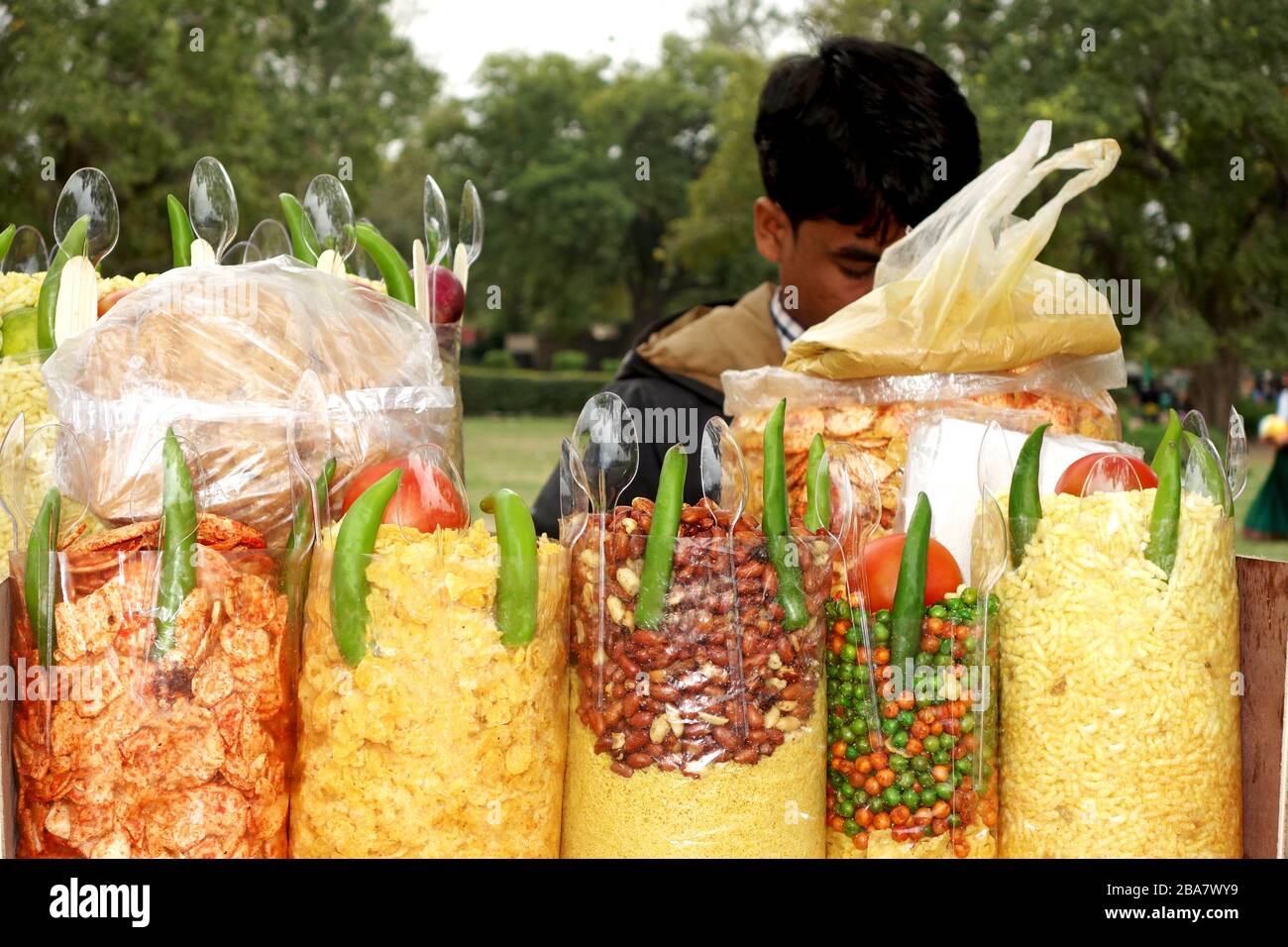 Indian street vendor selling Snacks Stock Photo - Alamy