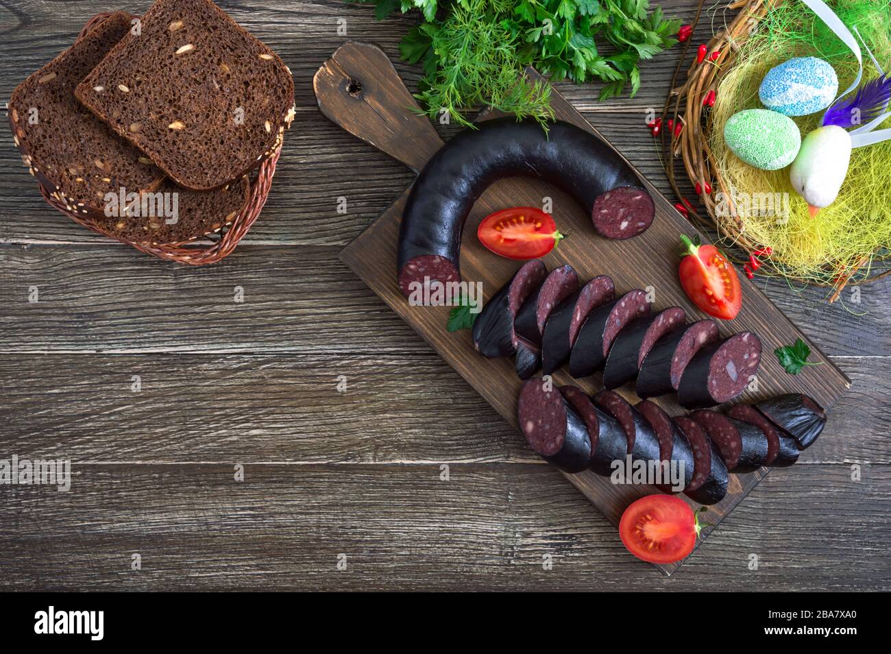 Morsilla - blood sausage. Pieces of Spanish black pudding on a wooden ...