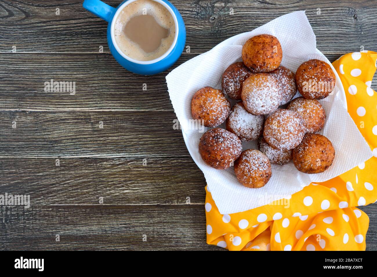 Curd balls fries on breakfast. Freshly made donuts with powdered sugar ...
