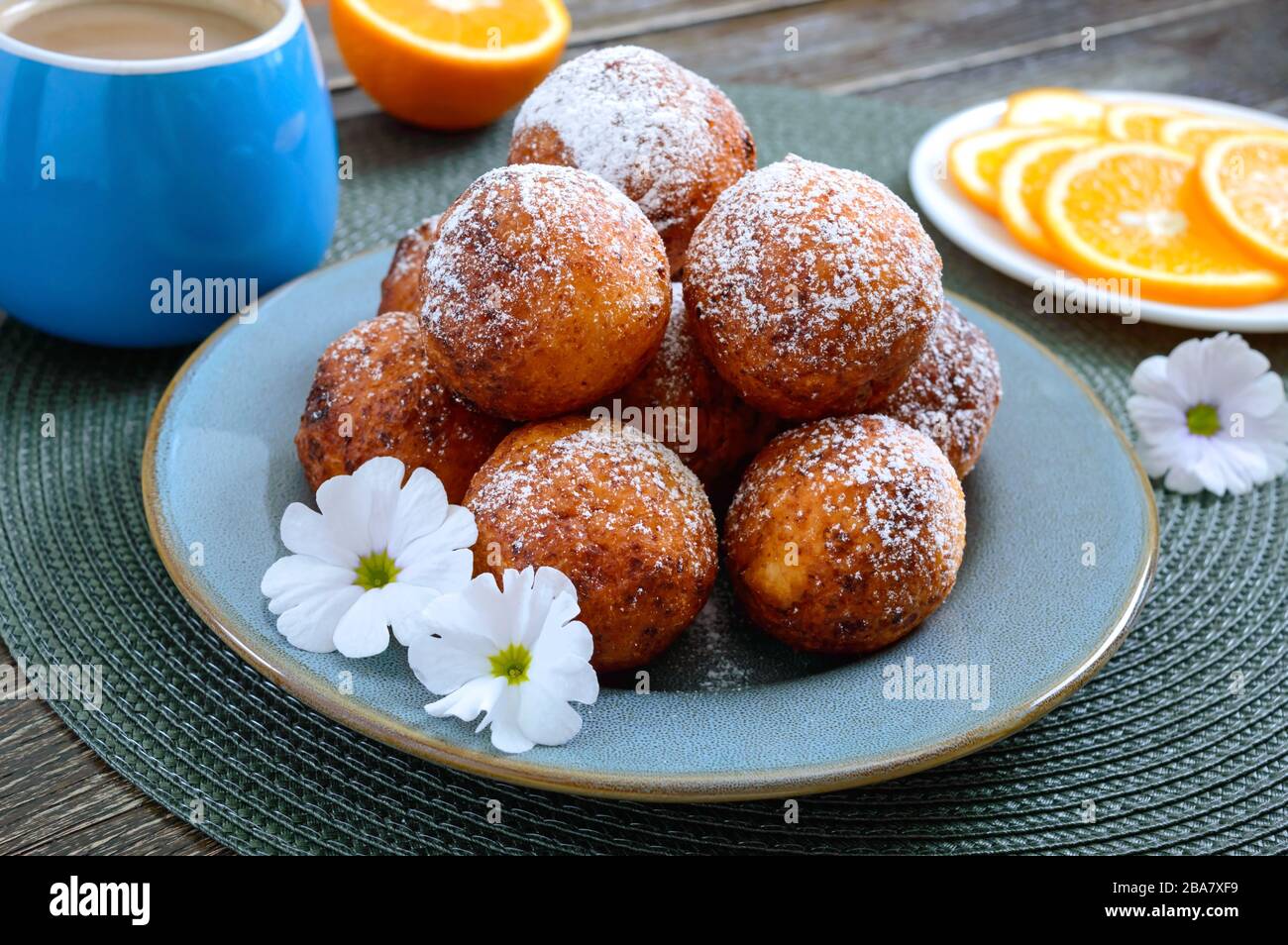 Curd balls fries on breakfast. Freshly made donuts with powdered sugar ...
