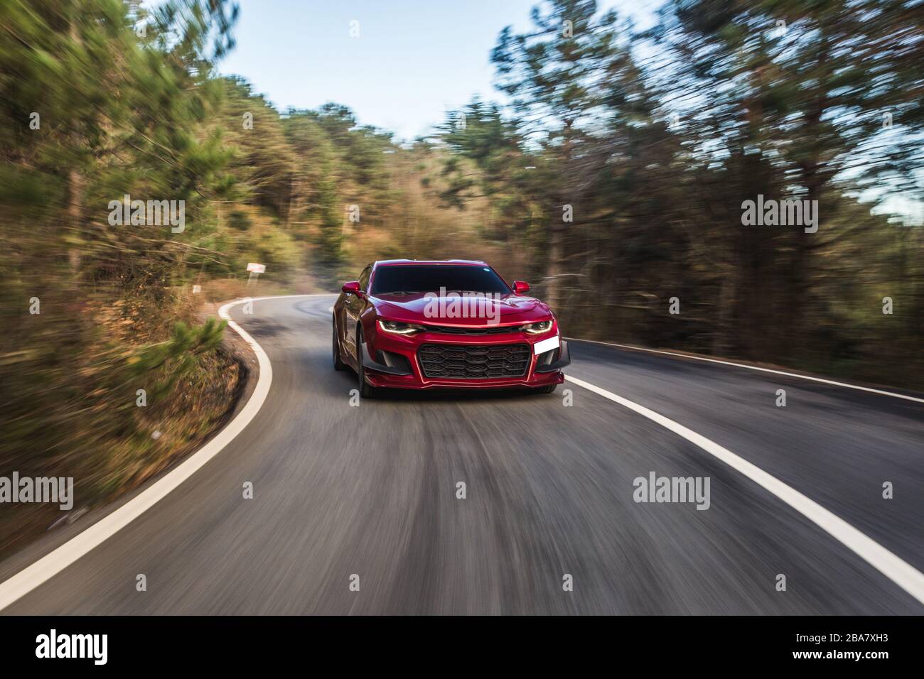 Red luxury business class sedan high speed drive Stock Photo - Alamy