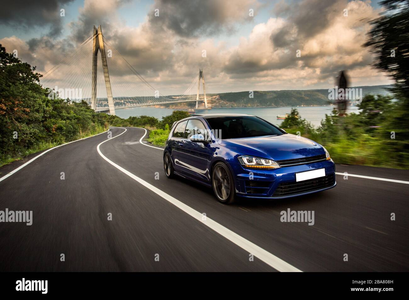 Blue business class hatchback commercial Stock Photo - Alamy