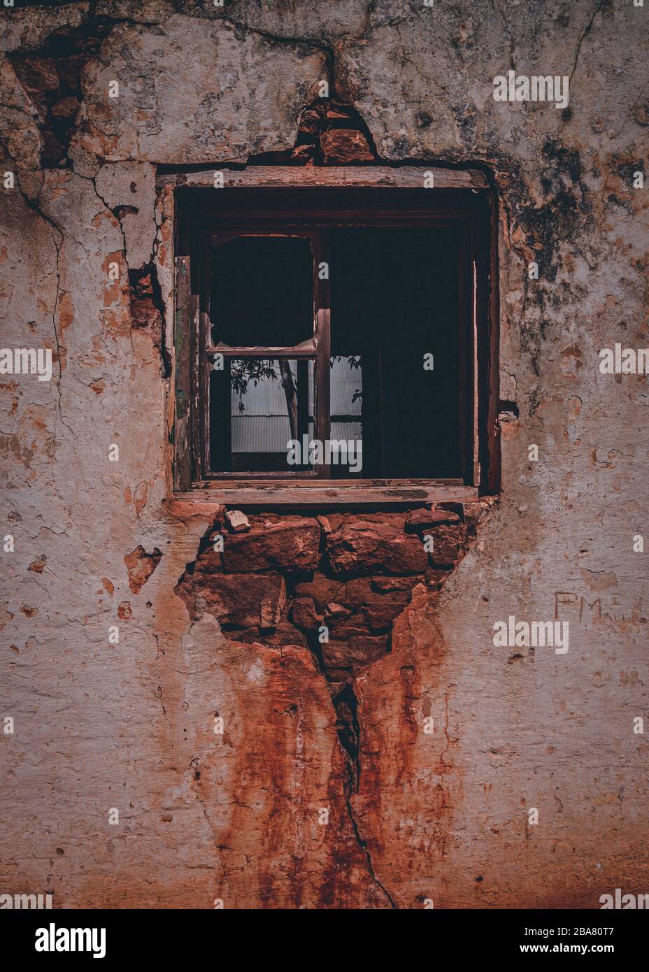 A damaged aged window in an old abandoned building Stock Photo - Alamy