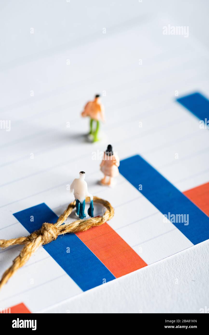 Selective focus of people figures with loop on surface with graphs ...