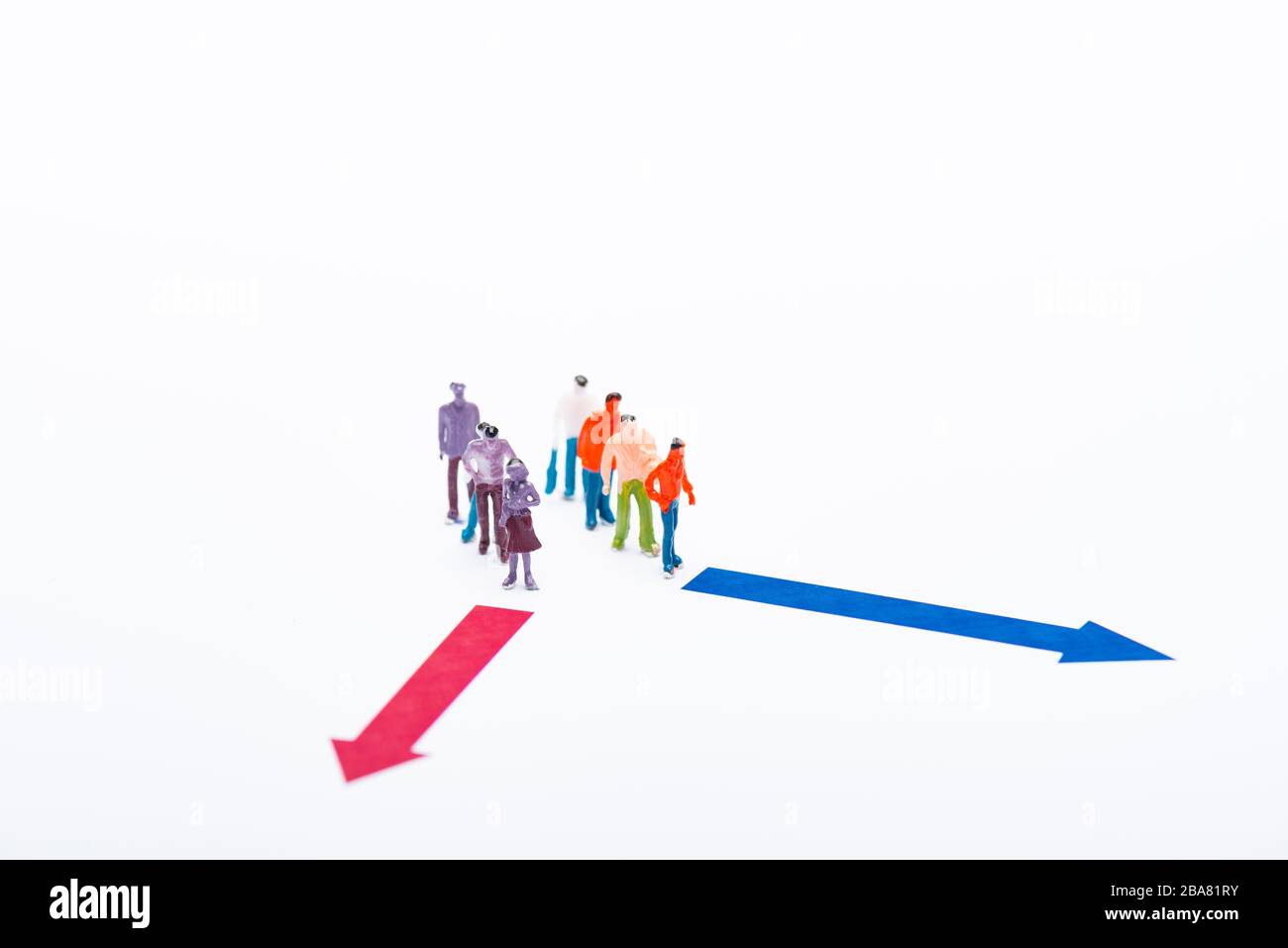 Plastic people figures near red and blue arrows isolated on white ...