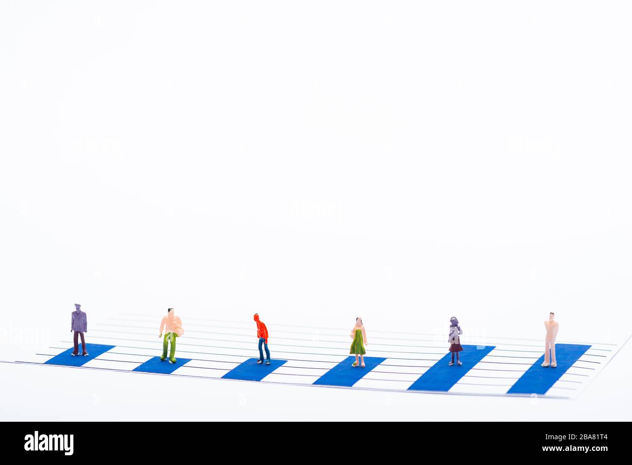 Concept of equality with people figures on surface of blue graphs ...