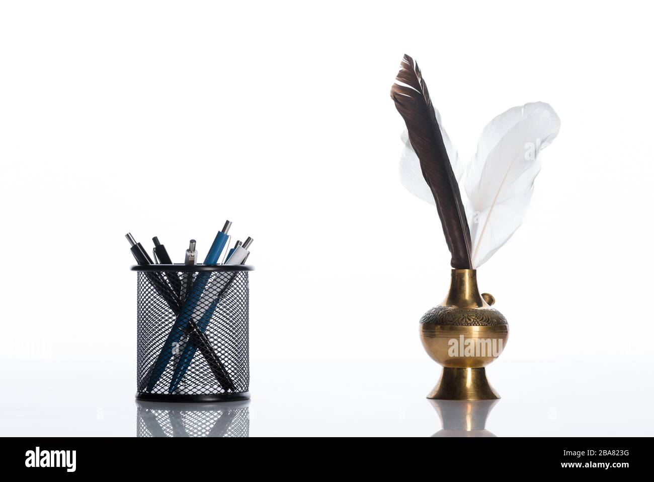 evolution of pens on white with copy space Stock Photo - Alamy