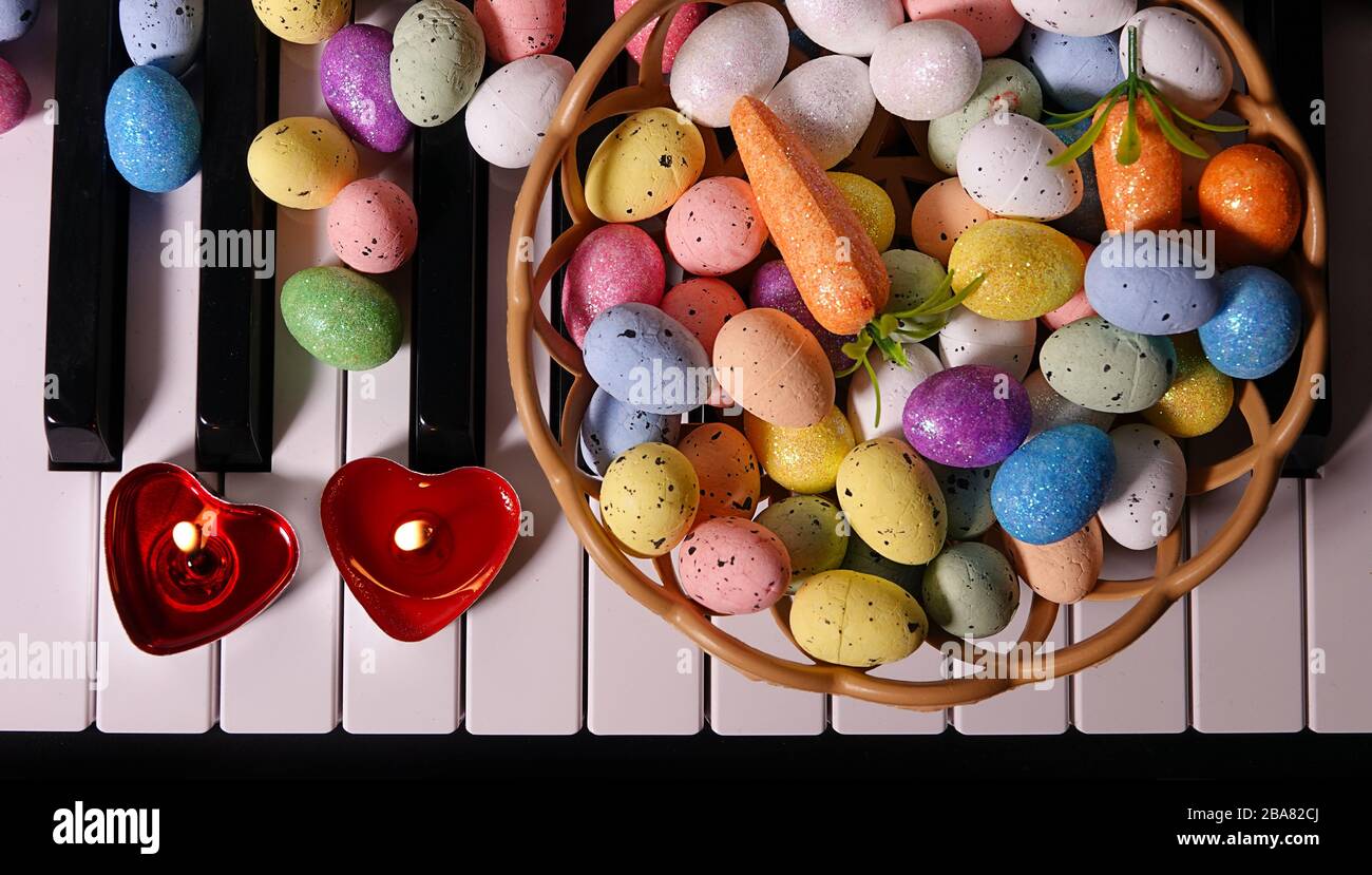 Colorful Paschal Easter Eggs and Piano Keys Stock Photo - Alamy