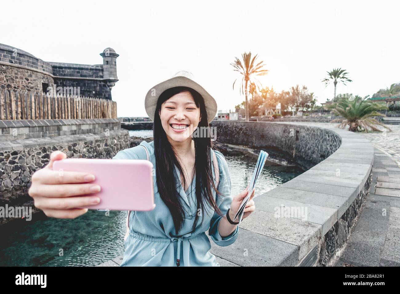 Influencer asian woman creating contents with smartphone - Chinese girl ...