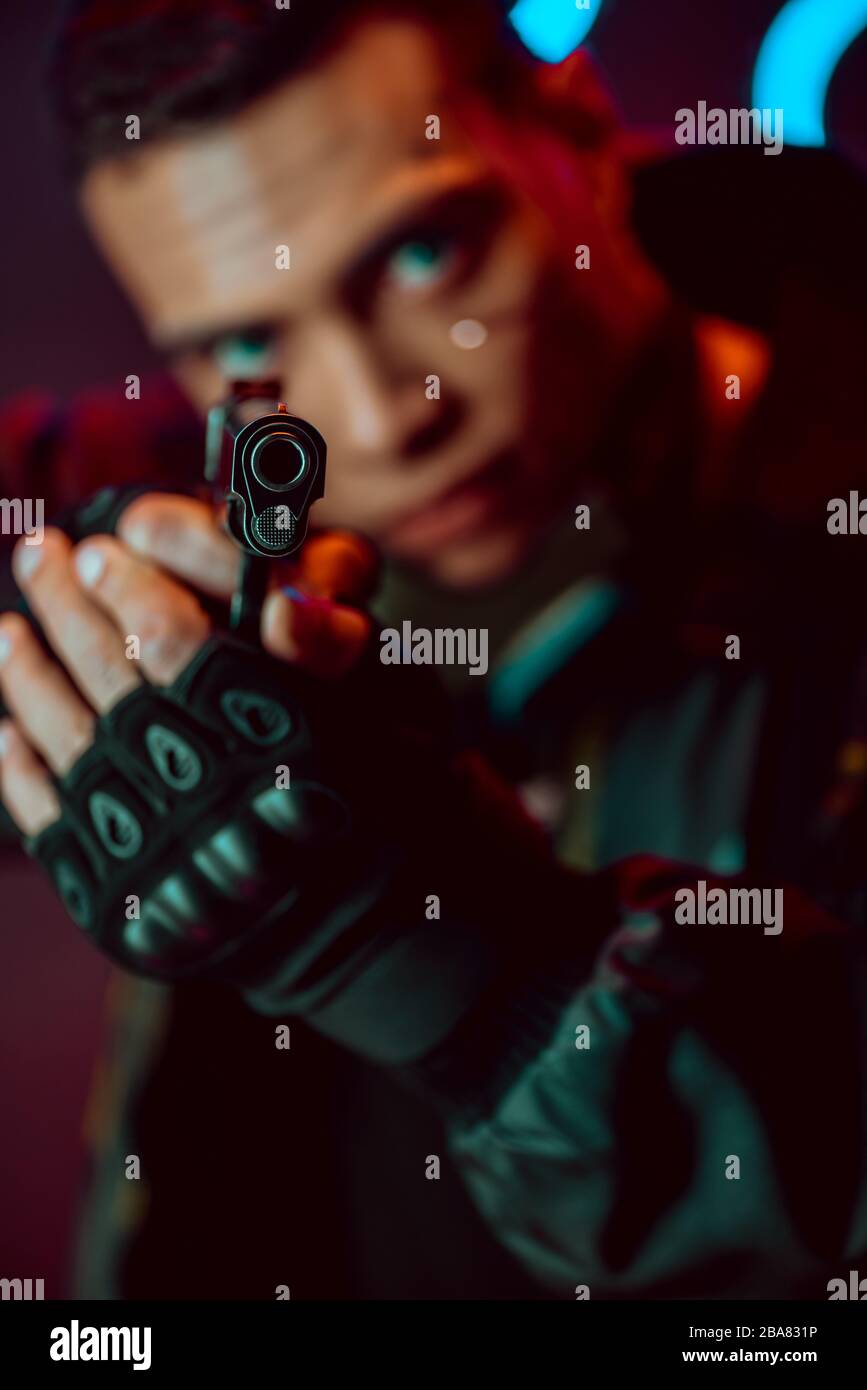 Gun in hands hi-res stock photography and images - Alamy