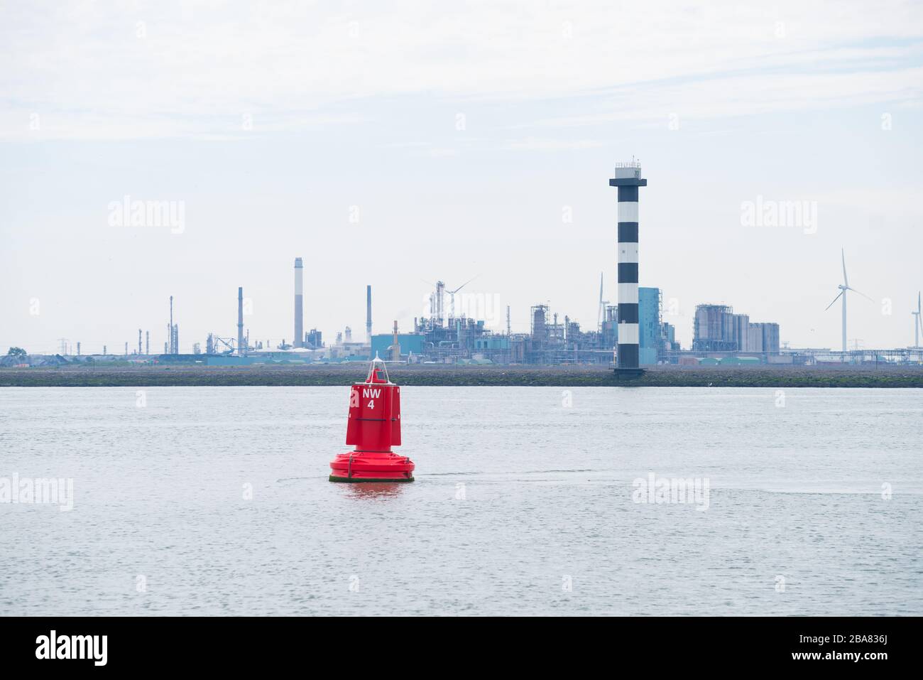 red navigation buoy in the New Water Way (Nieuwe Waterweg), the access ...