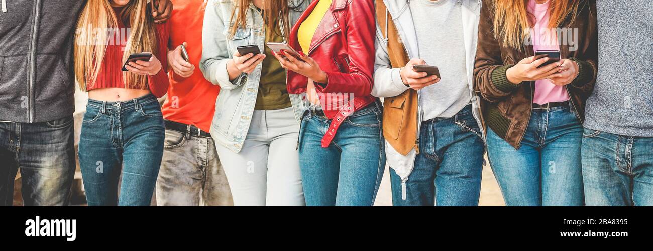 Group of friends using smart mobile phones app - Teenagers addiction to ...