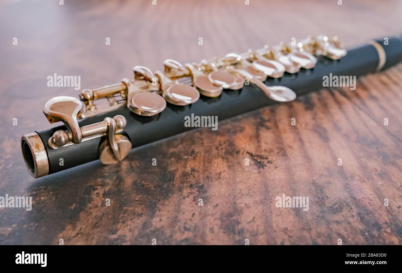 4 Close up of classic wooden flute on a hardwood background Stock Photo ...