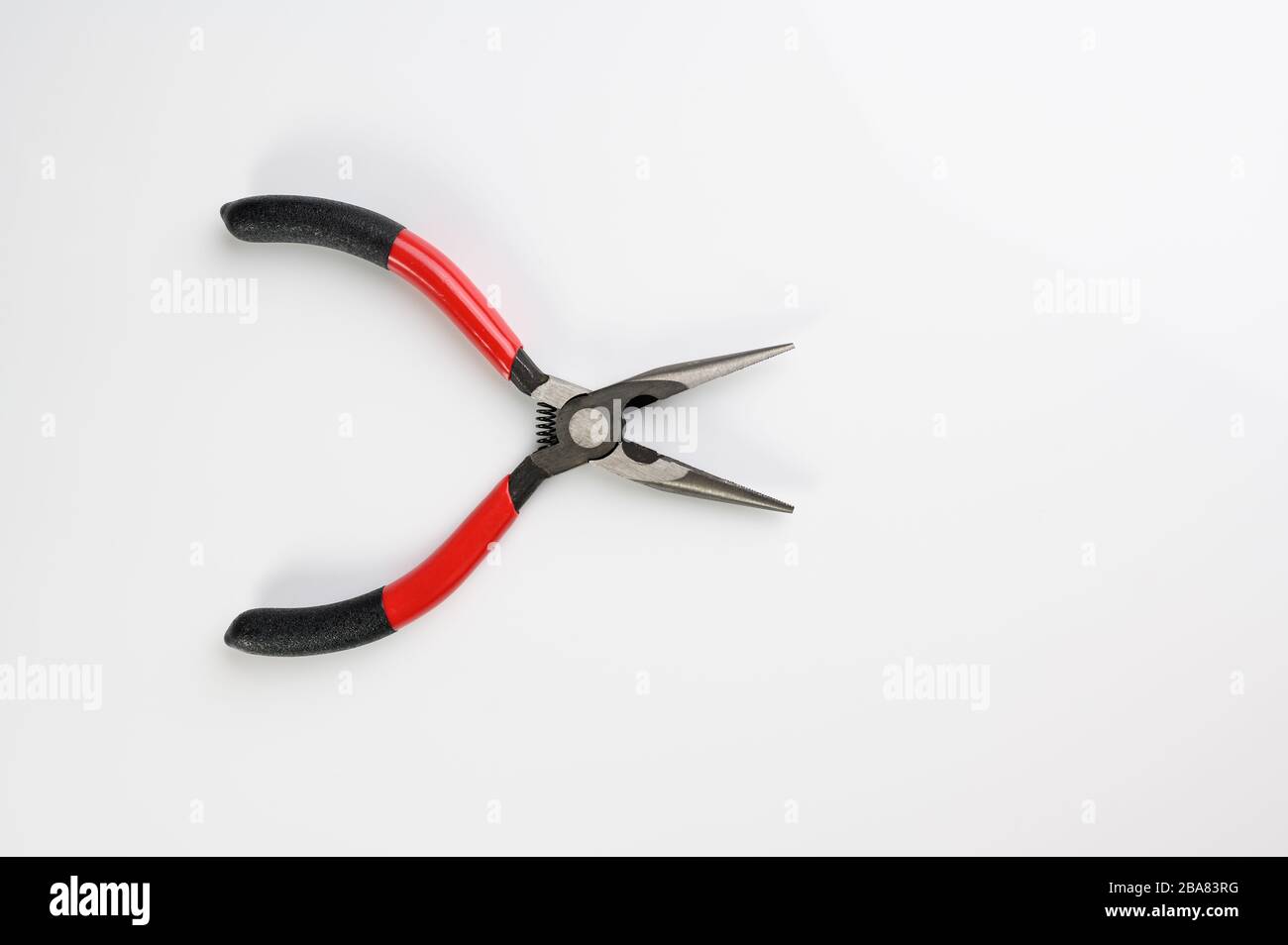 small spring loaded hand long nosed pliers for precision repairs and ...