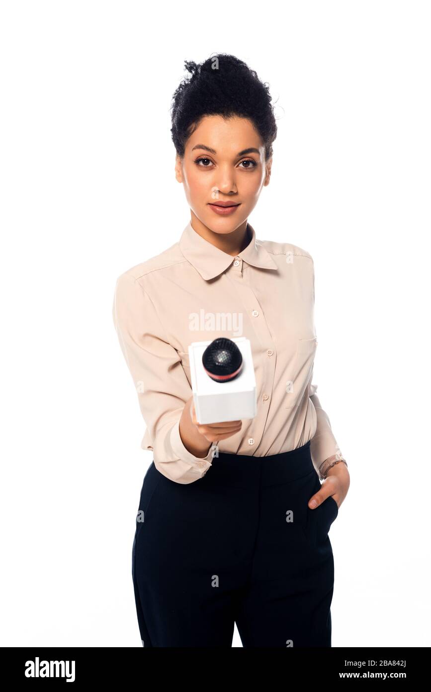 Front view of african american journalist holding microphone with ...