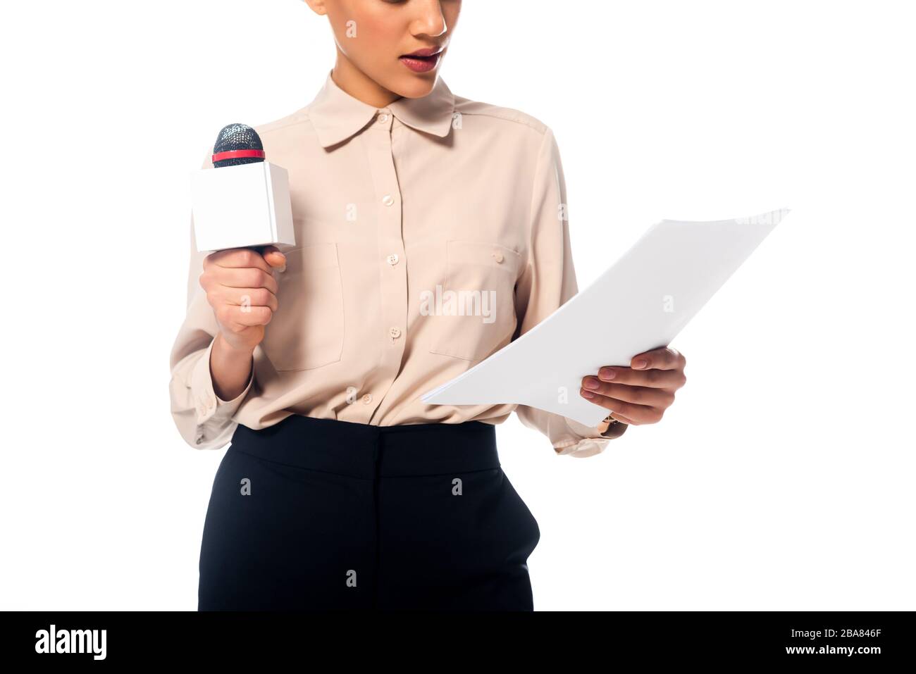 Cropped view of african american journalist with microphone reading ...