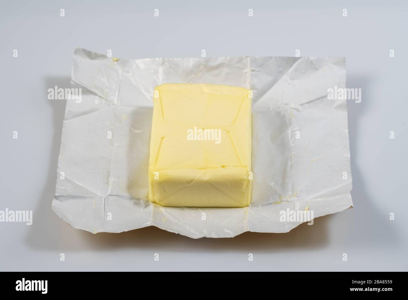 The wrapped butter is open for proper nutrition with amino acids for ...