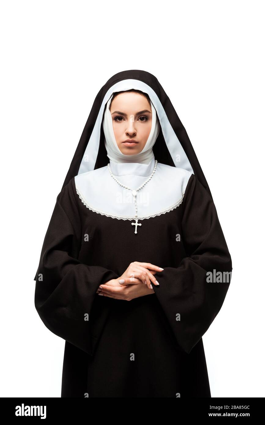 beautiful serious nun in black clothing, isolated on white Stock Photo ...