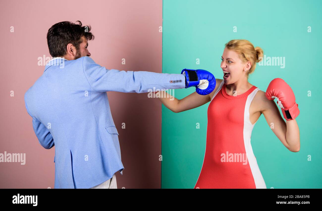 Gender battle. Gender equal rights. Family quarrel. Strong punch ...