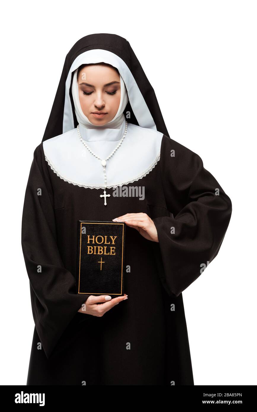 beautiful nun holding holy bible isolated on white Stock Photo - Alamy