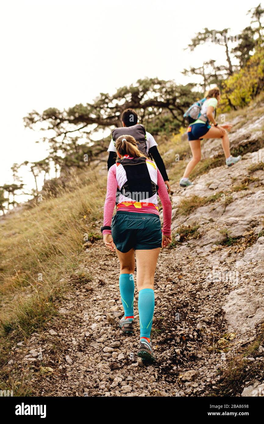 Group of people walking uphill hi-res stock photography and images - Alamy