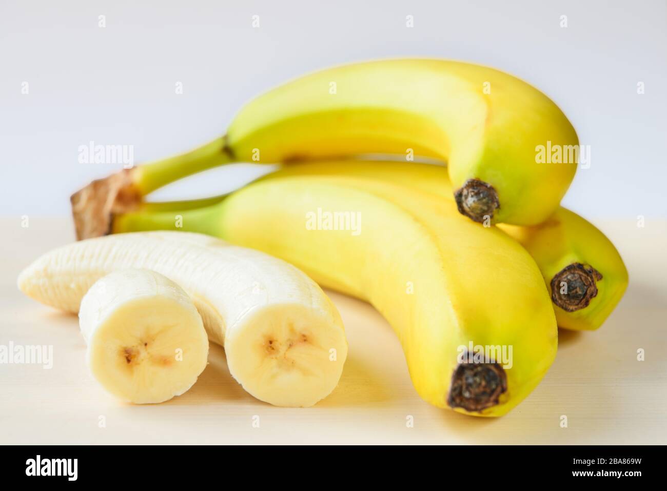 Cut bananas on a cutting board Stock Photo - Alamy