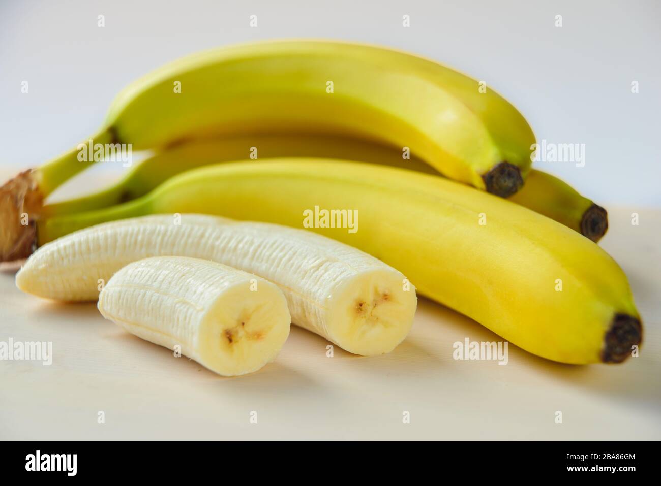 Cut bananas on a cutting board Stock Photo - Alamy
