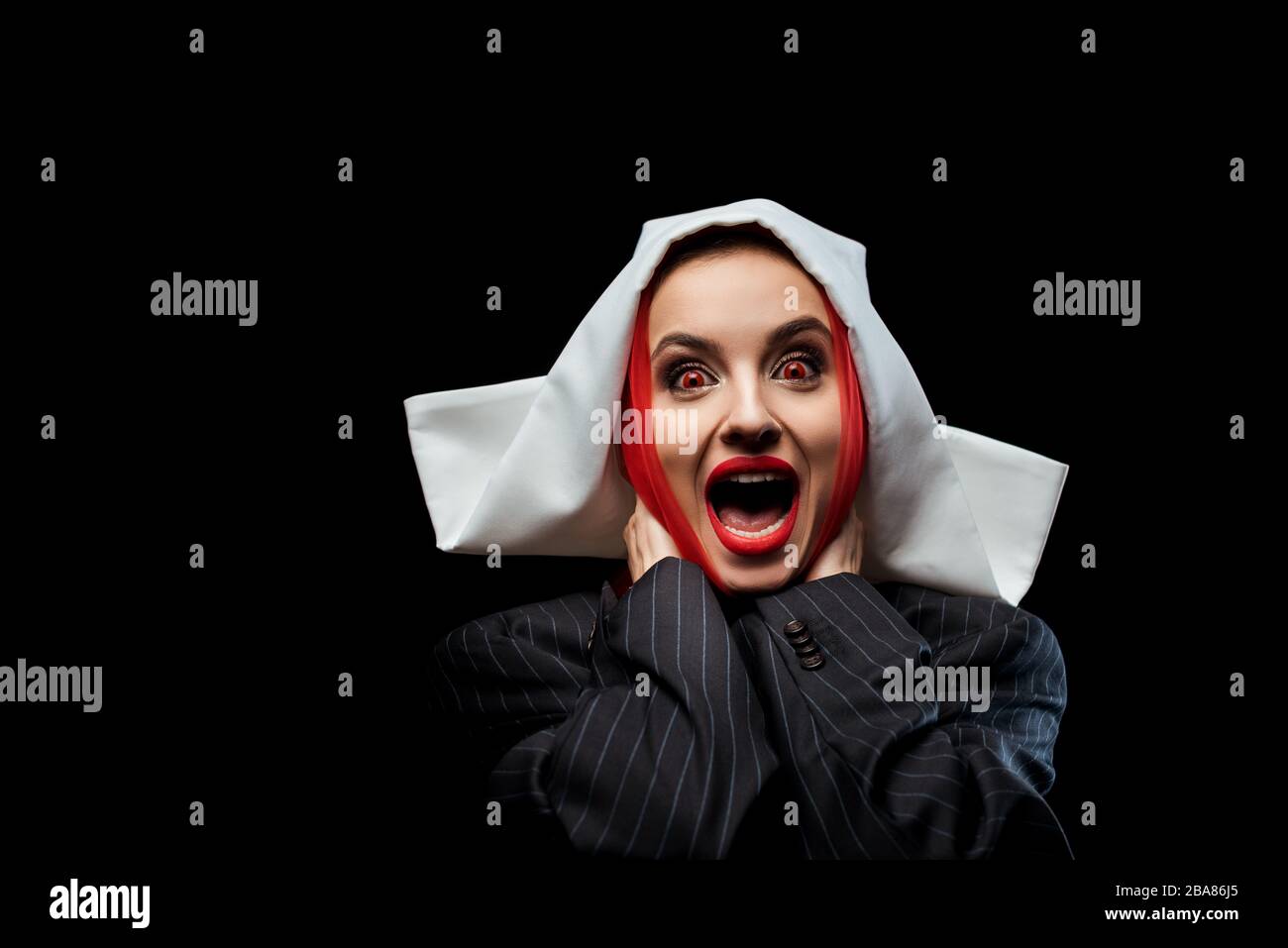 excited demonic nun with red eyes shouting isolated on black Stock ...