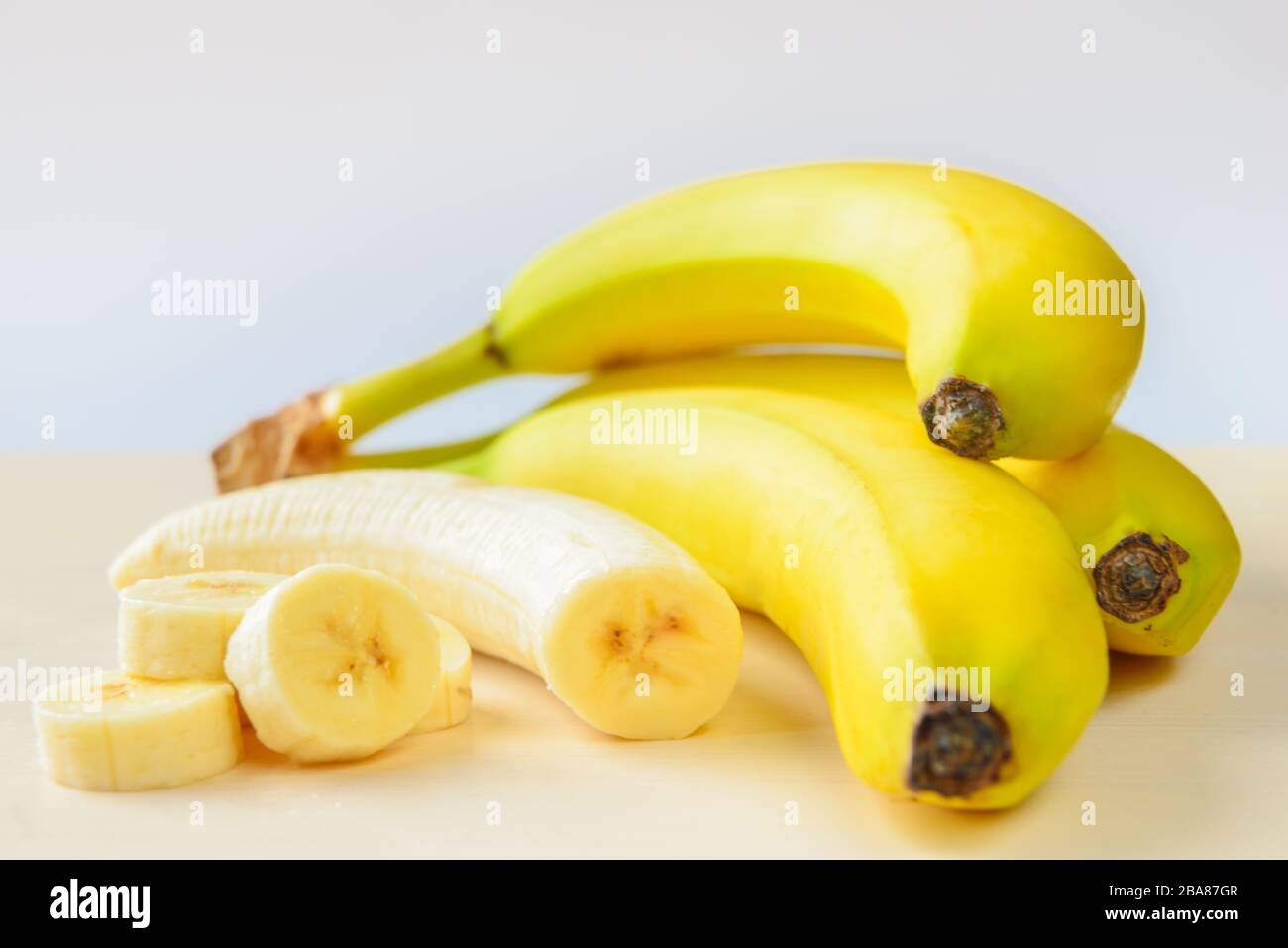 Cut bananas on a cutting board Stock Photo - Alamy
