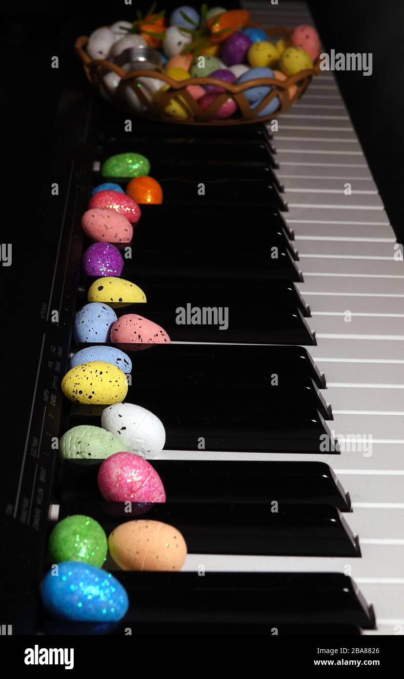 Colorful Paschal Easter Eggs and Piano Keys Stock Photo - Alamy