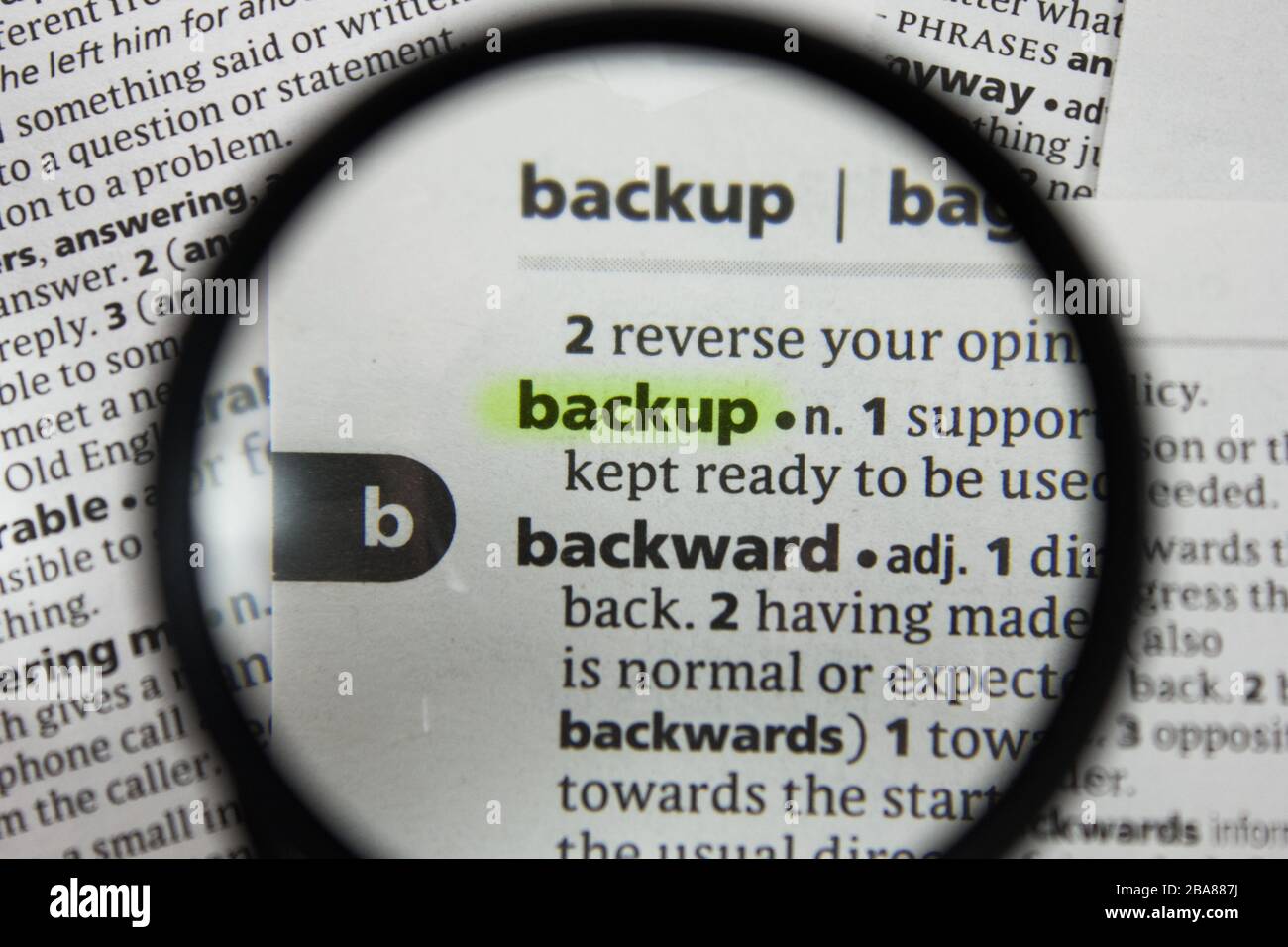 The word or phrase backup in a dictionary Stock Photo - Alamy