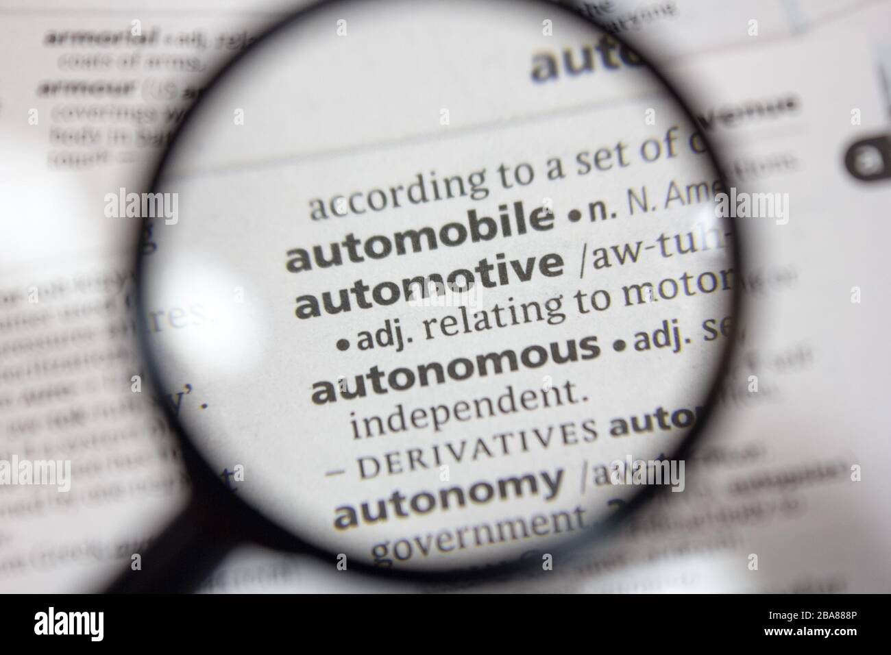 The word of phrase automotive in a dictionary Stock Photo - Alamy