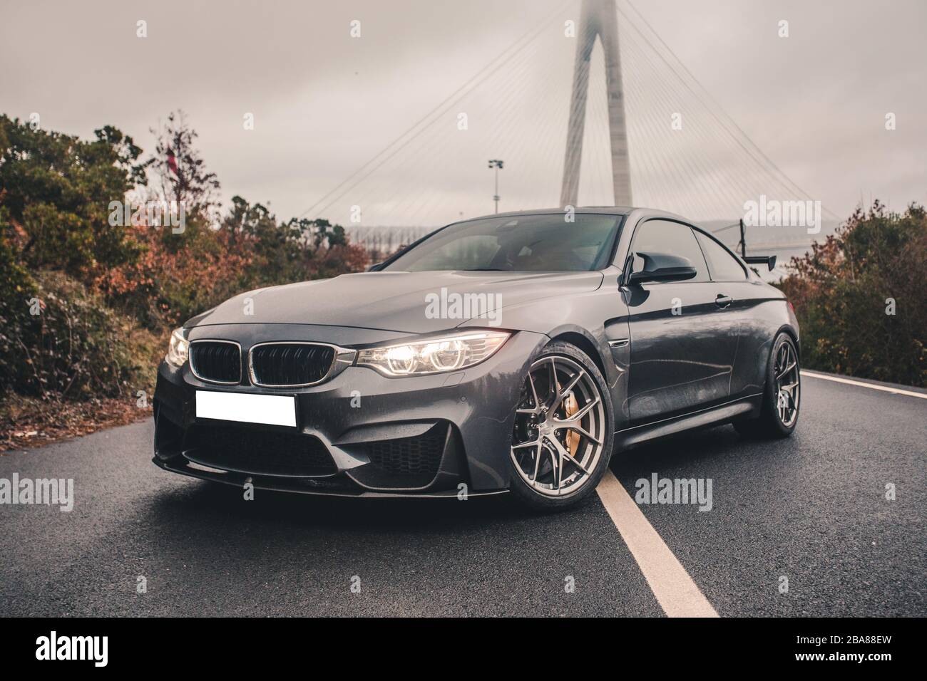 Black luxury sport car advertisement shooting on the highway Stock ...