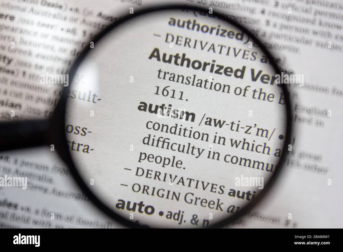 The word of phrase autism in a dictionary Stock Photo - Alamy